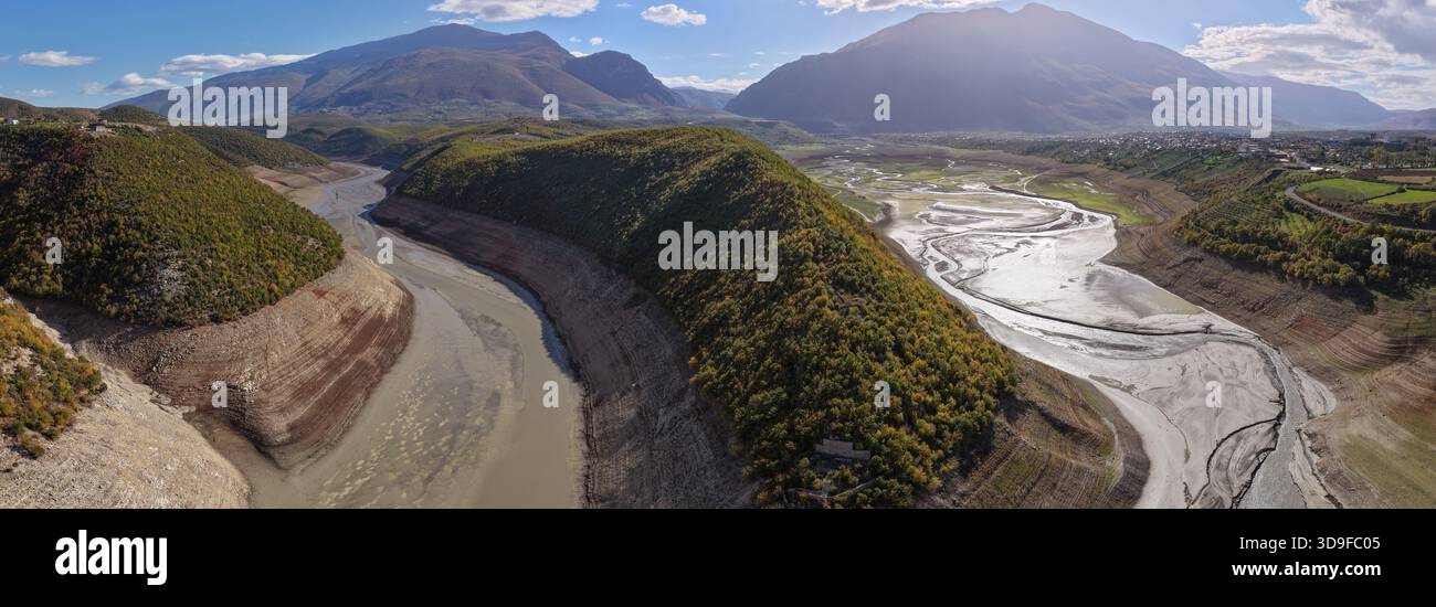 Aerial panorama of Kukës valley with dramatic dried riverbeds, forested ...