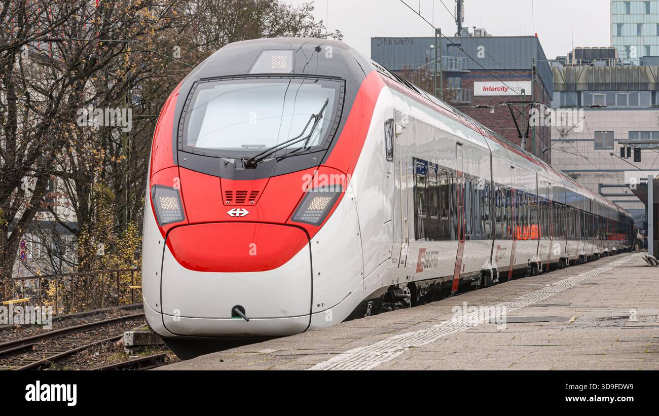 05 December 2025, Hamburg: A Swiss high-speed train "Giruno" stands in ...
