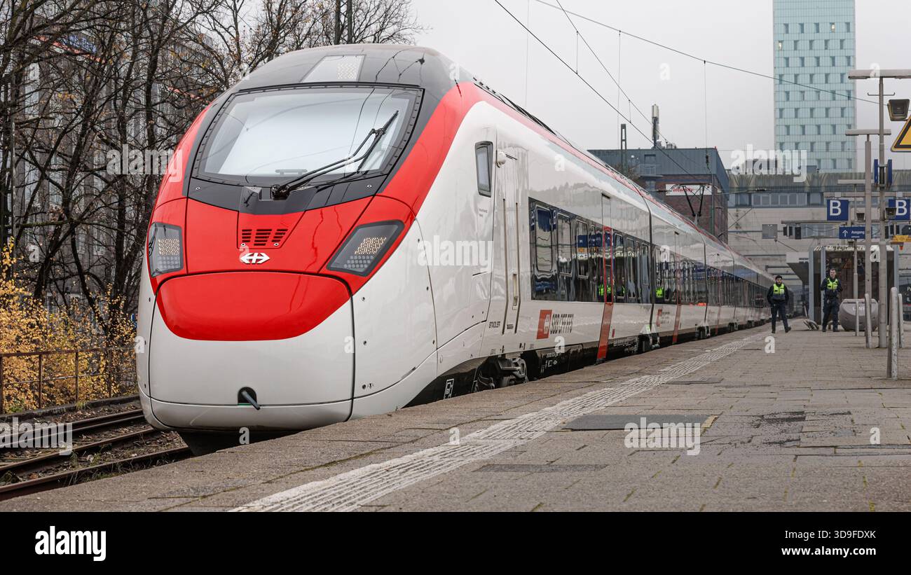 05 December 2025, Hamburg: A Swiss high-speed train "Giruno" stands in ...