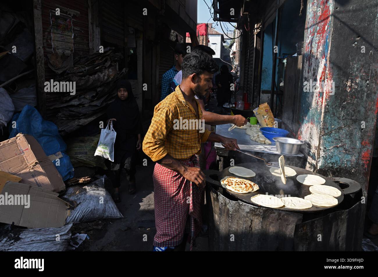 Daily life resumes at the Korail after the devastating fire. (Photo by Piyas Biswas / SOPA ...