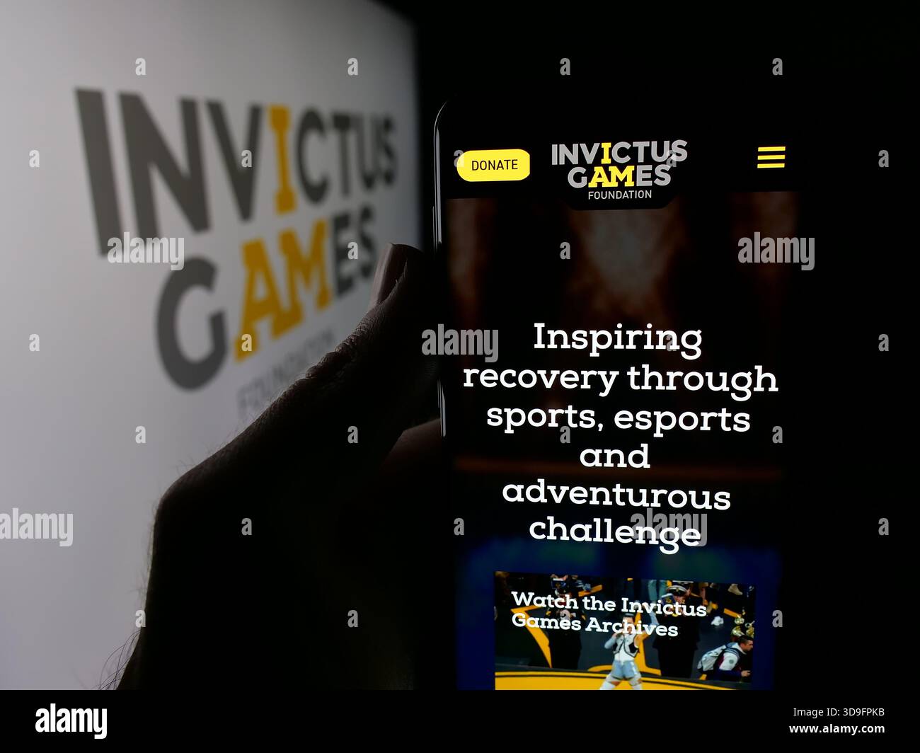In this photo illustration, a smartphone with the web page of international sport event Invictus ...