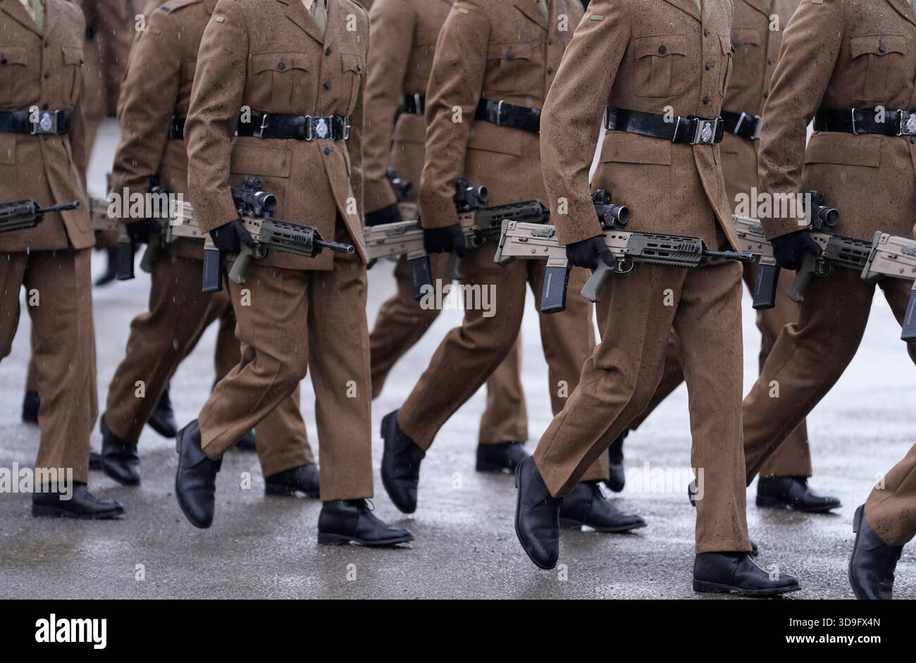 Members of the 5th Battalion, The Rifles (5 Rifles) carry their rifles ...