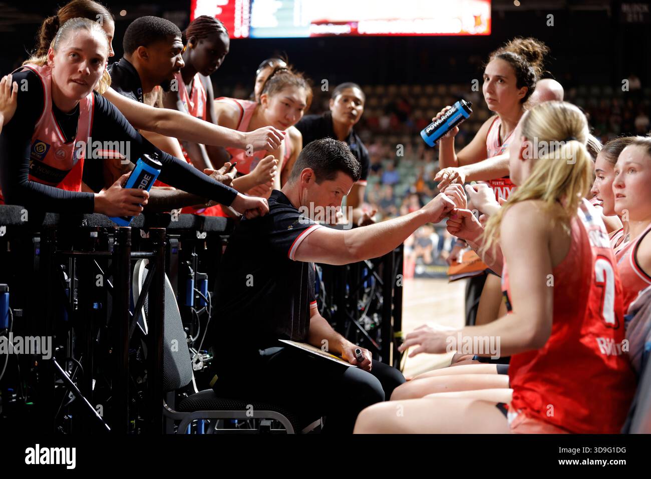 Ryan Petrik, head coach of the Perth Lynx talks with his players during ...