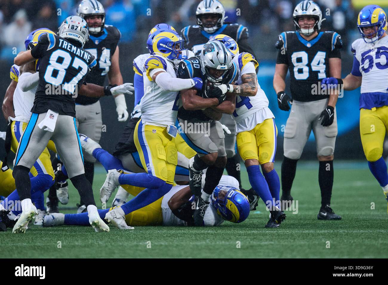 Carolina Panthers running back Chuba Hubbard (30) is wrapped up by Los ...