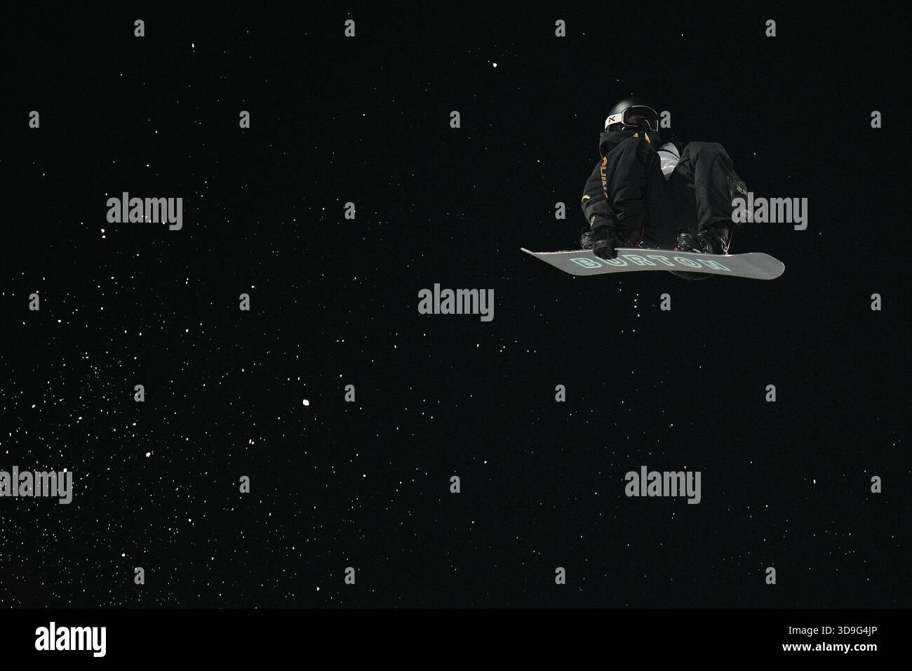Ge Chunyu, of China competes in the men's snowboard big air qualifying ...