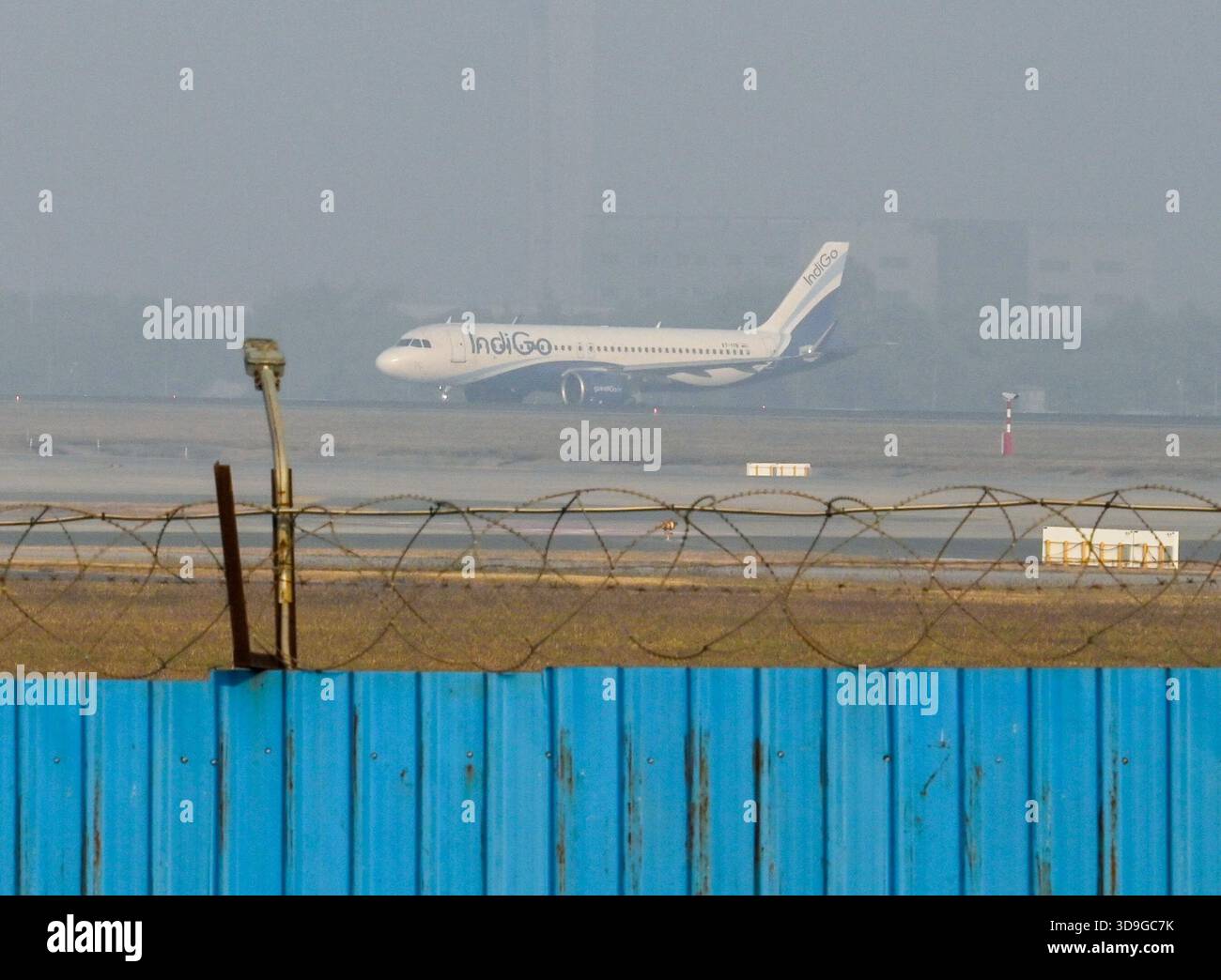 NEW DELHI, INDIA - DECEMBER 5: Indigo passengers plane at Taxiway at ...