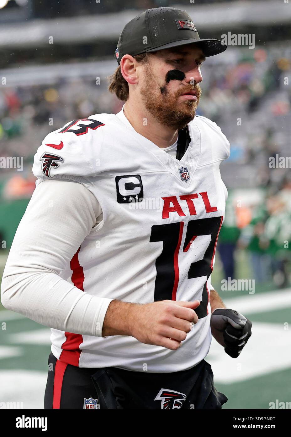Atlanta Falcons punter Bradley Pinion (13) runs off the field during an ...