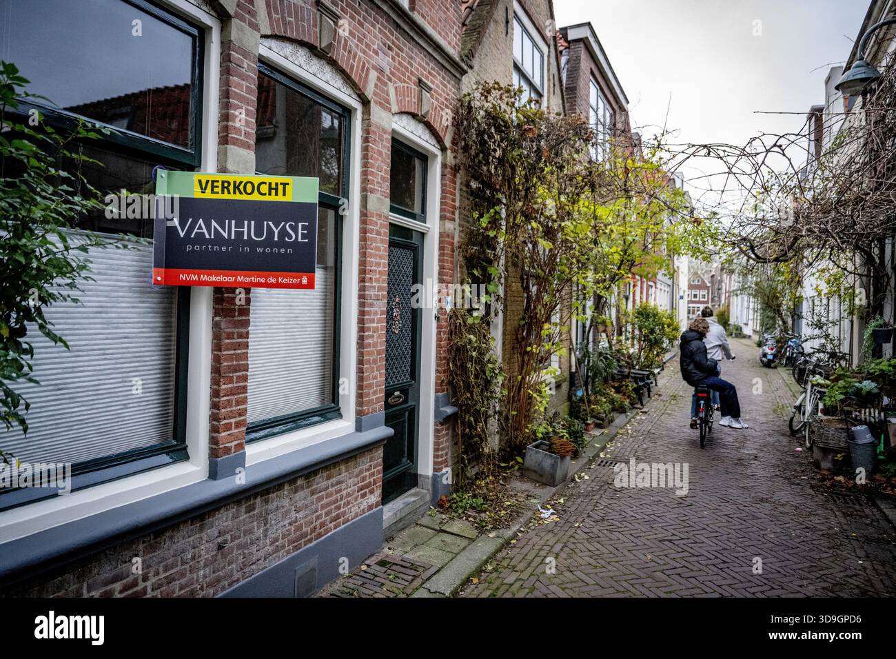 GOUDA - A house for sale with a real estate agent's for sale sign. In ...