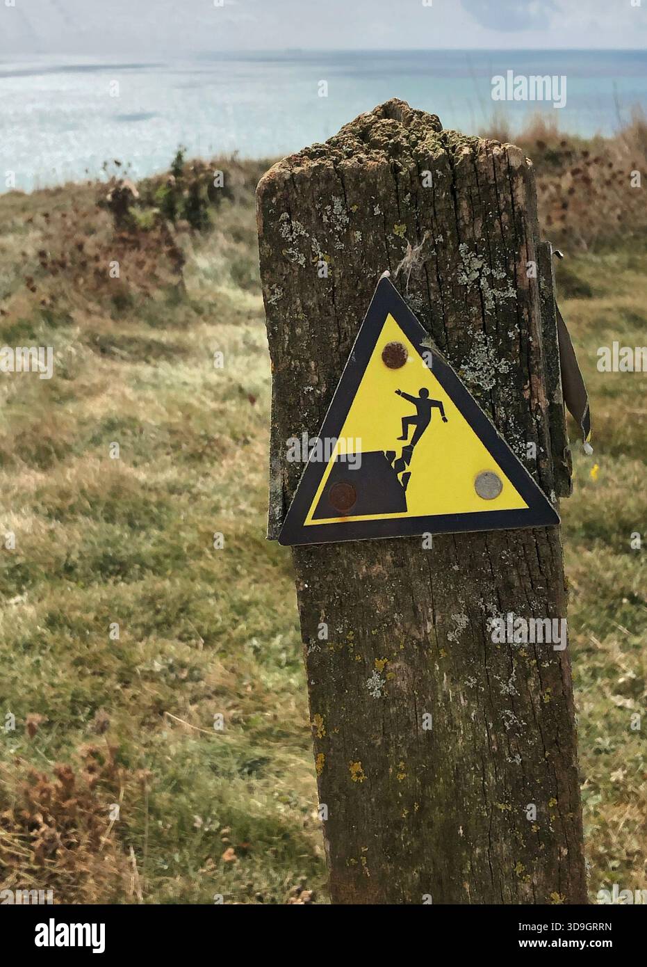 loose rock warning sign Stock Photo - Alamy