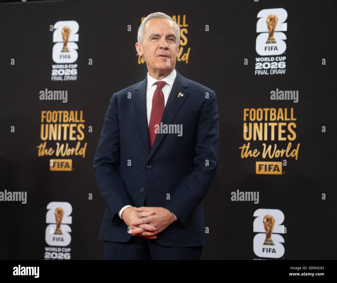 Canadian Prime Minister Mark Carney arrives to attend the draw for the ...