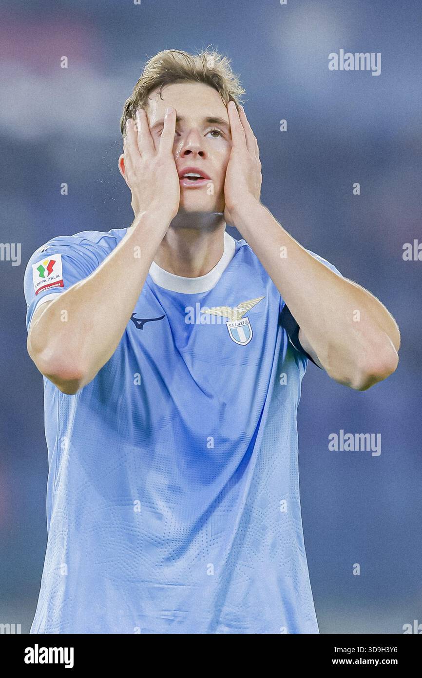 Lazio's Croatian midfielder Toma Basic looks dejected during Coppa ...