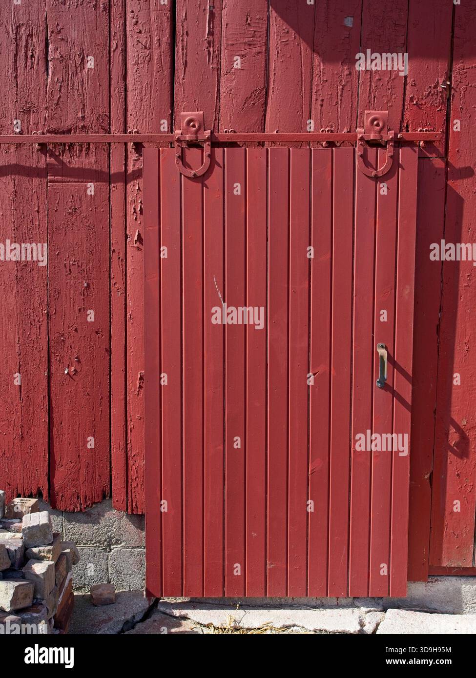 Rustic red sliding barn door at Carter Historic Farm, a nature ...