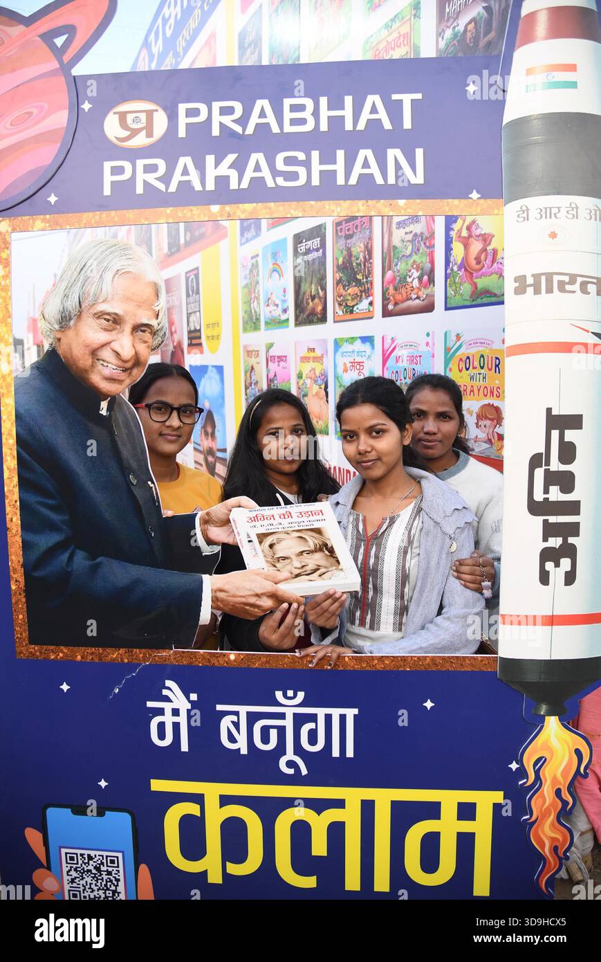 PATNA, INDIA - DECEMBER 5: Book lovers pose with cutout of former ...