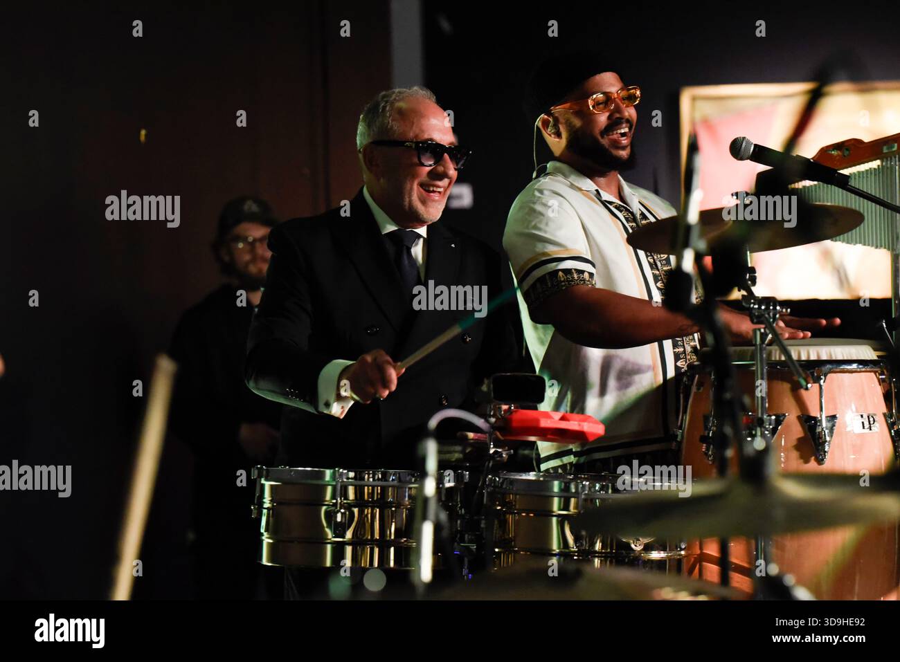 Emilio Estefan plays the drums during Gary Nader Art Centre kick off ...