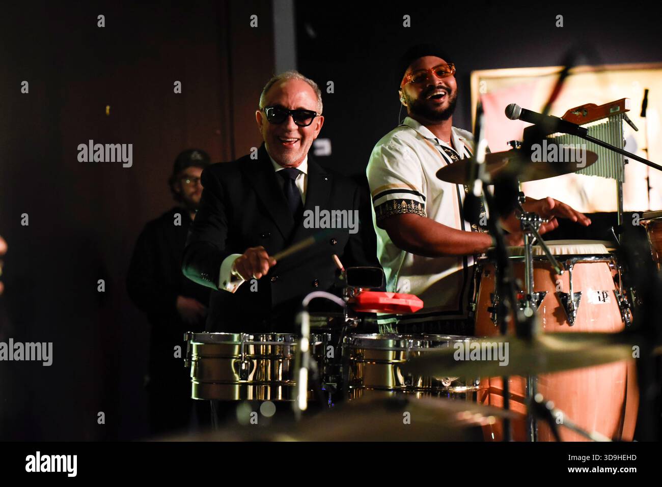 Emilio Estefan plays the drums during Gary Nader Art Centre kick off ...