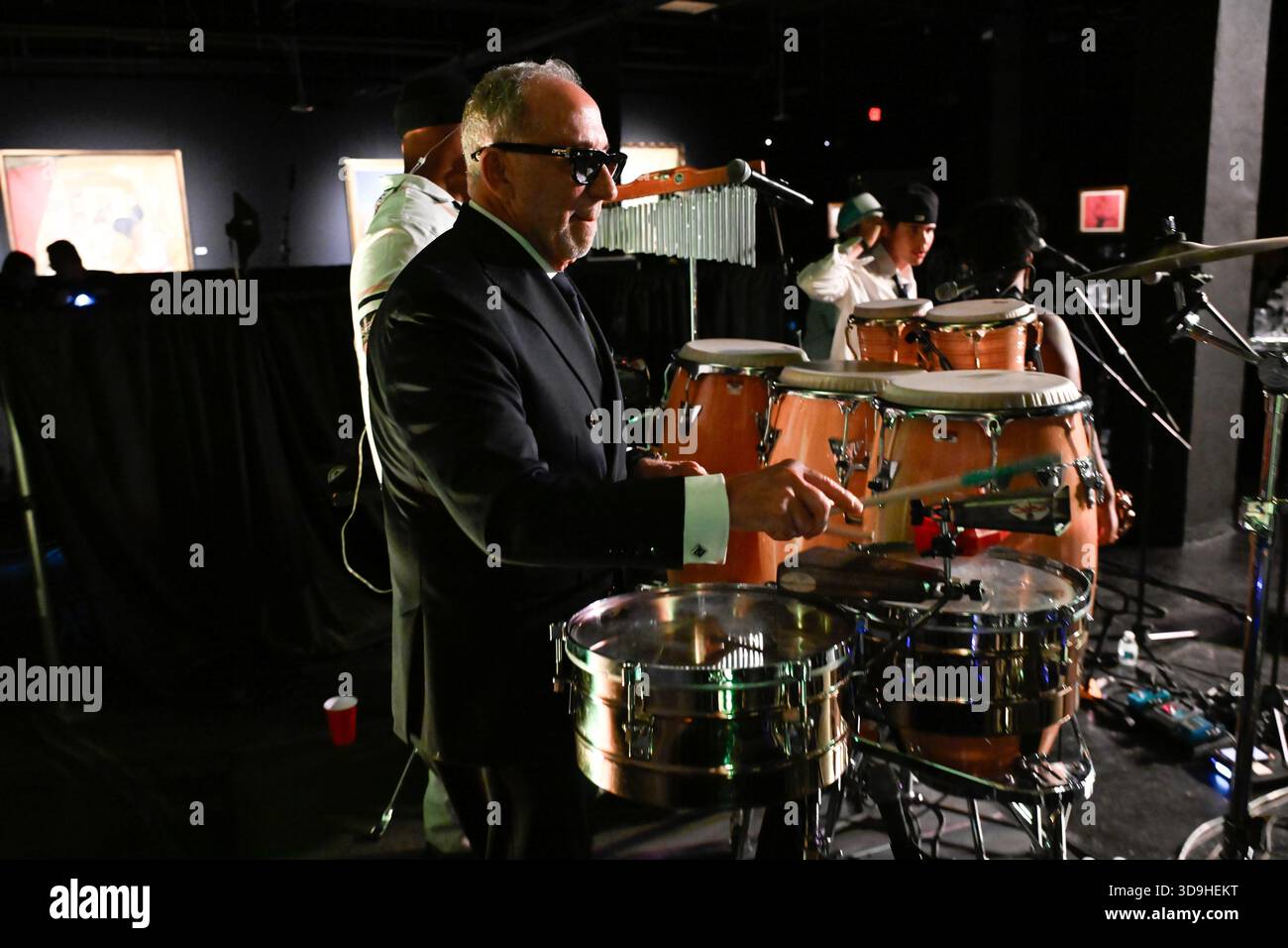 Emilio Estefan plays the drums during Gary Nader Art Centre kick off ...