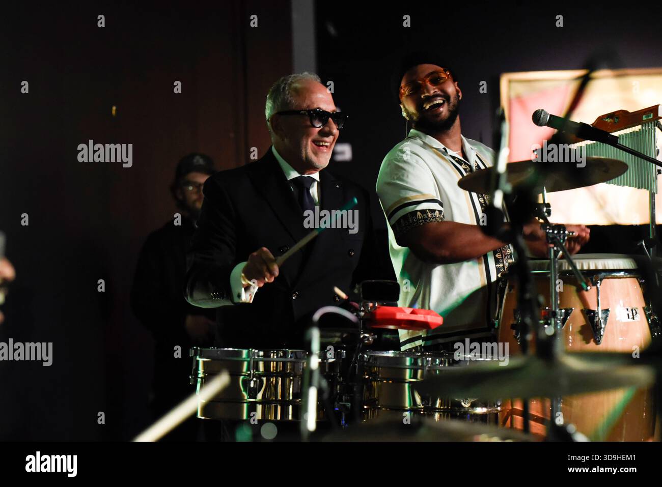 Emilio Estefan plays the drums during Gary Nader Art Centre kick off ...