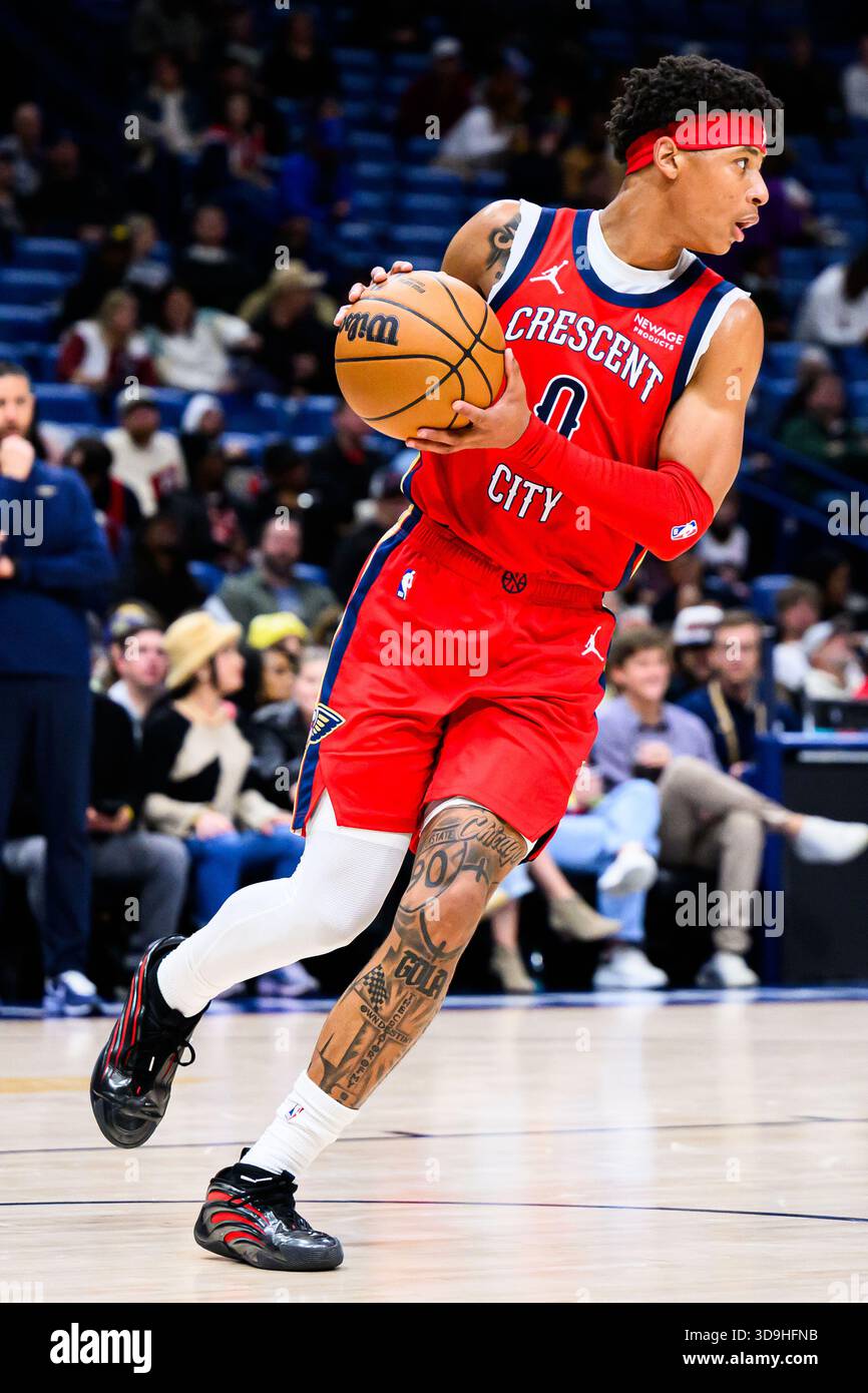 New Orleans Pelicans guard Jeremiah Fears (0) drives the ball in the ...