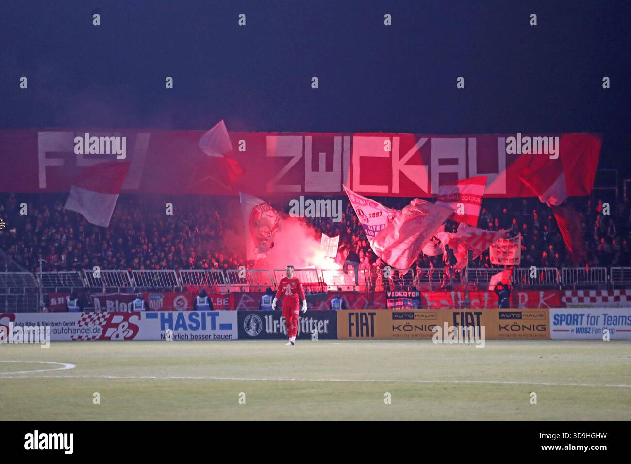 The fan block of FSV Zwickau, ultras, with pyrotechnics and flags ...