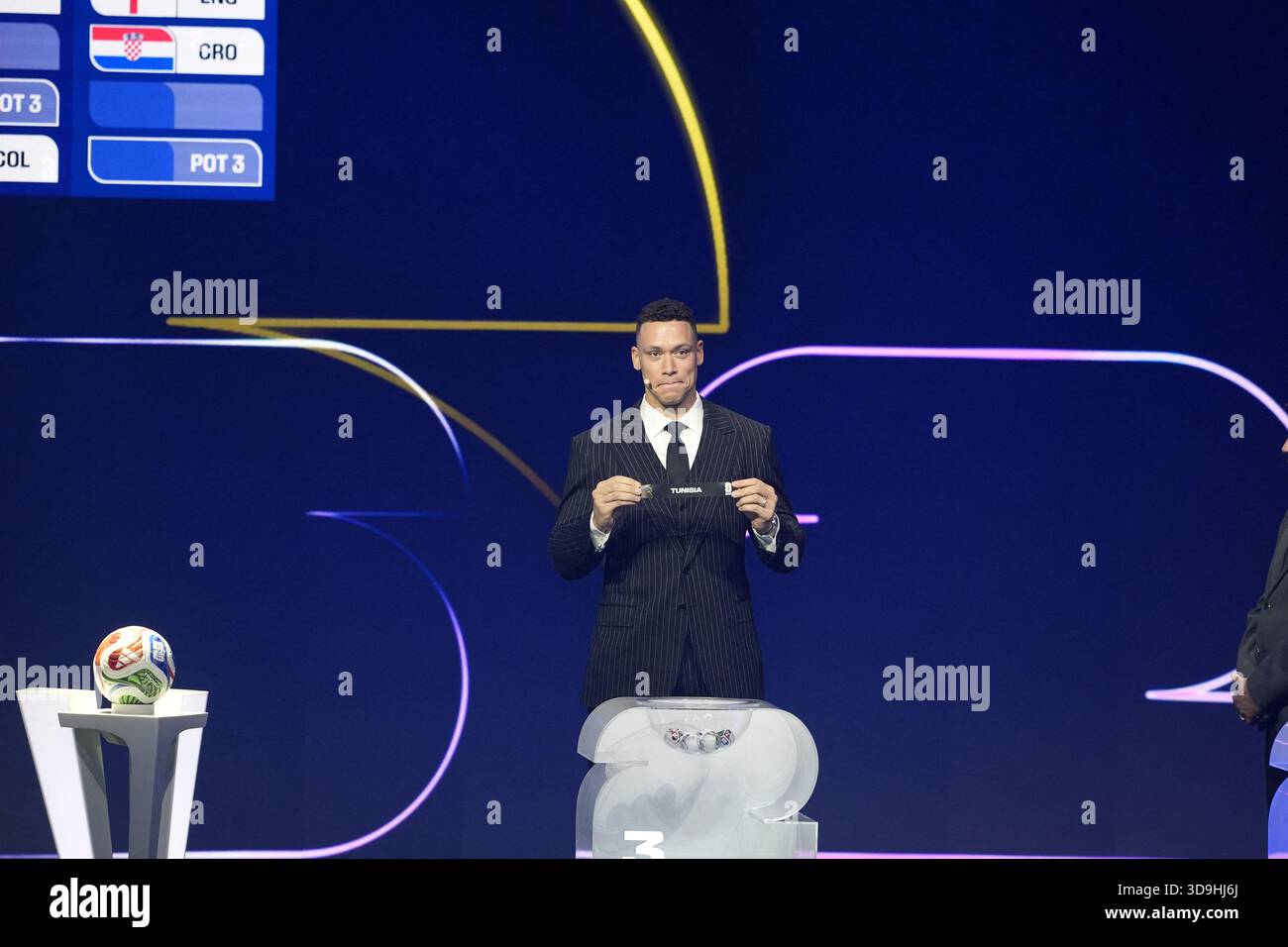 Draw assistant Aaron Judge during the draw ceremony for the 2026 FIFA ...