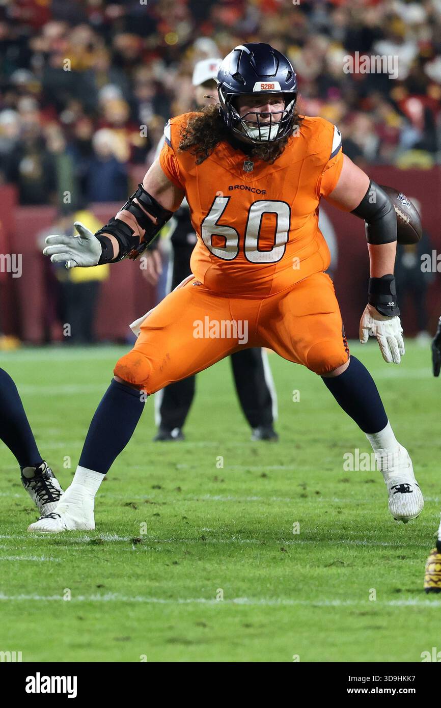 Denver Broncos center Luke Wattenberg (60) blocks during an NFL ...