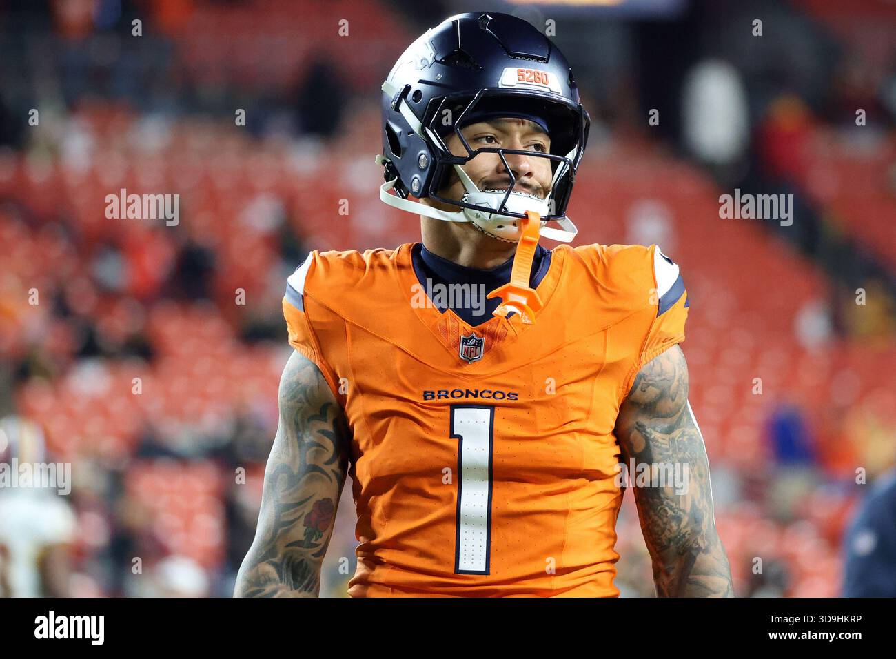 Denver Broncos tight end Evan Engram (1) looks on before an NFL ...