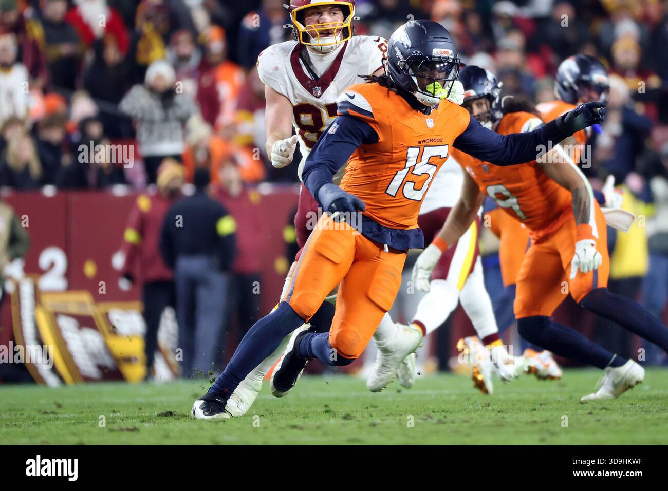 Denver Broncos linebacker Nik Bonitto (15) rushes during an NFL ...
