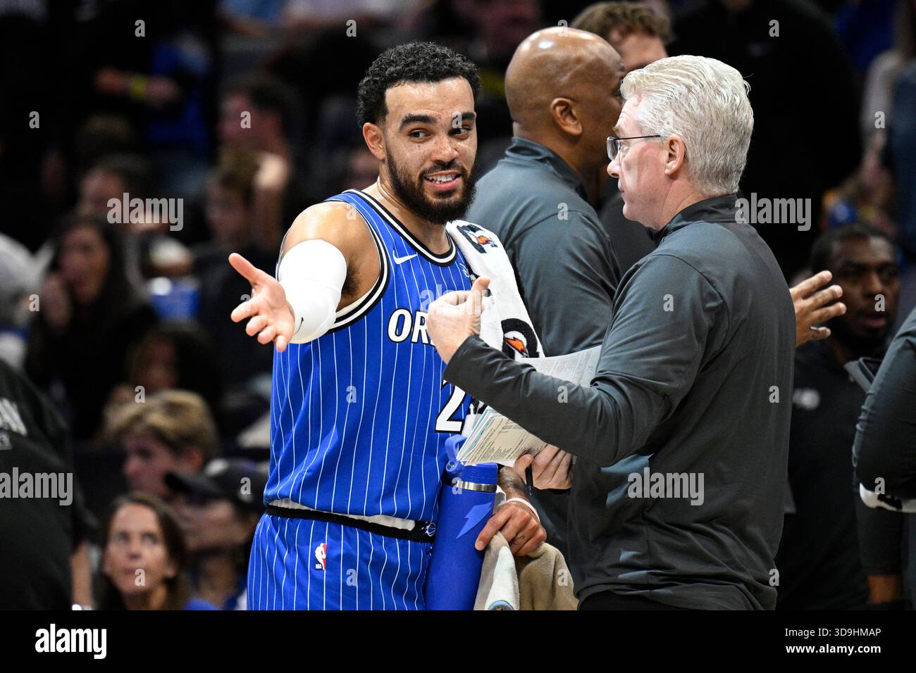 Orlando Magic guard Tyus Jones (2) talks with assistant coach Joe ...