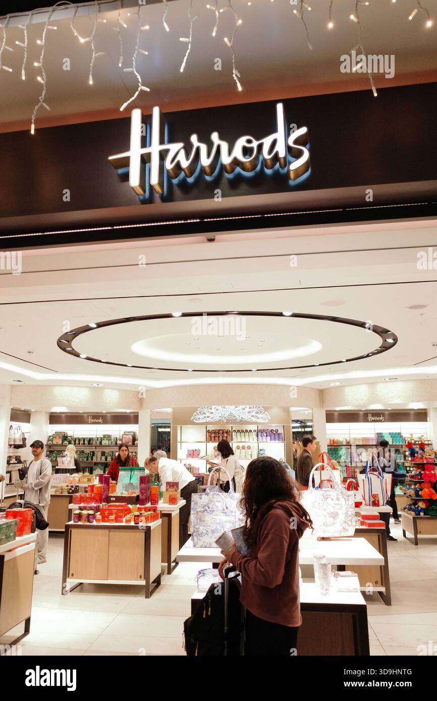 Harrods storefront and signage at Heathrow Airport in London, England ...