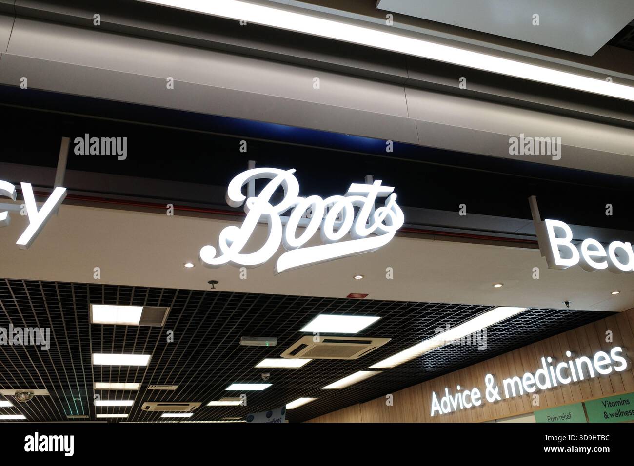 Boots UK health and beauty storefront and signage at Heathrow Airport ...