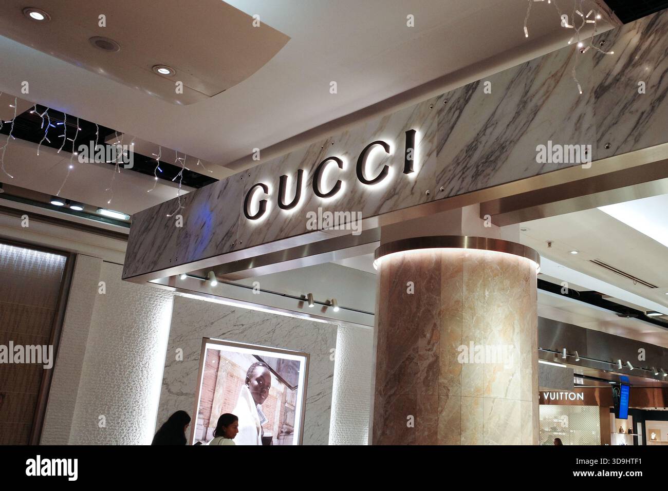Gucci storefront and signage at Heathrow Airport in London, England ...