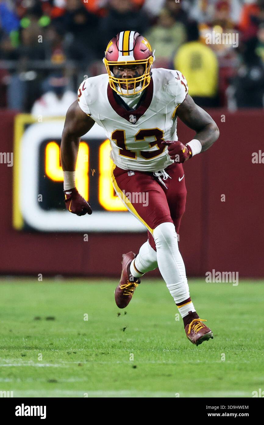 Washington Commanders wide receiver Treylon Burks (13) runs a route ...