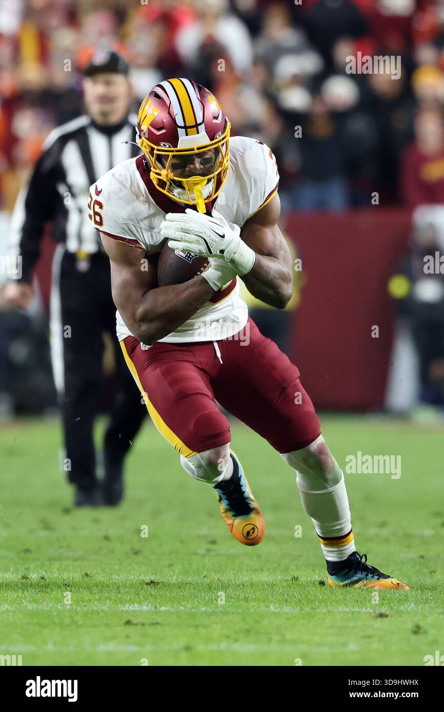 Washington Commanders running back Jeremy McNichols (26) runs with the ...