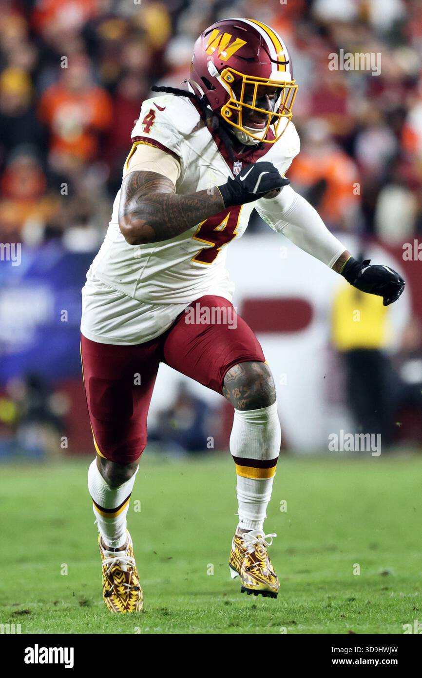 Washington Commanders linebacker Frankie Luvu (4) rushes during an NFL ...