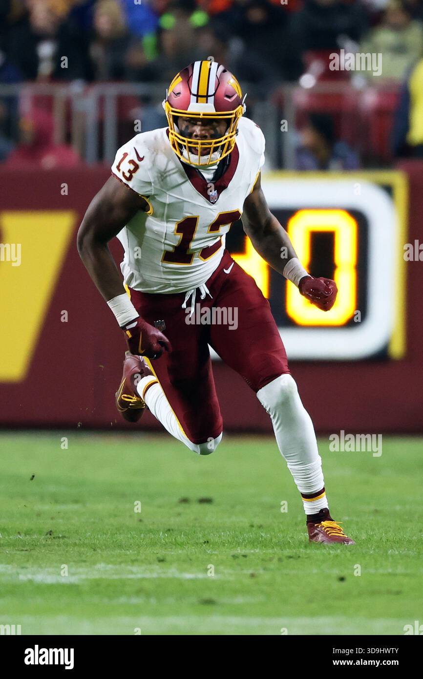 Washington Commanders wide receiver Treylon Burks (13) runs a route ...