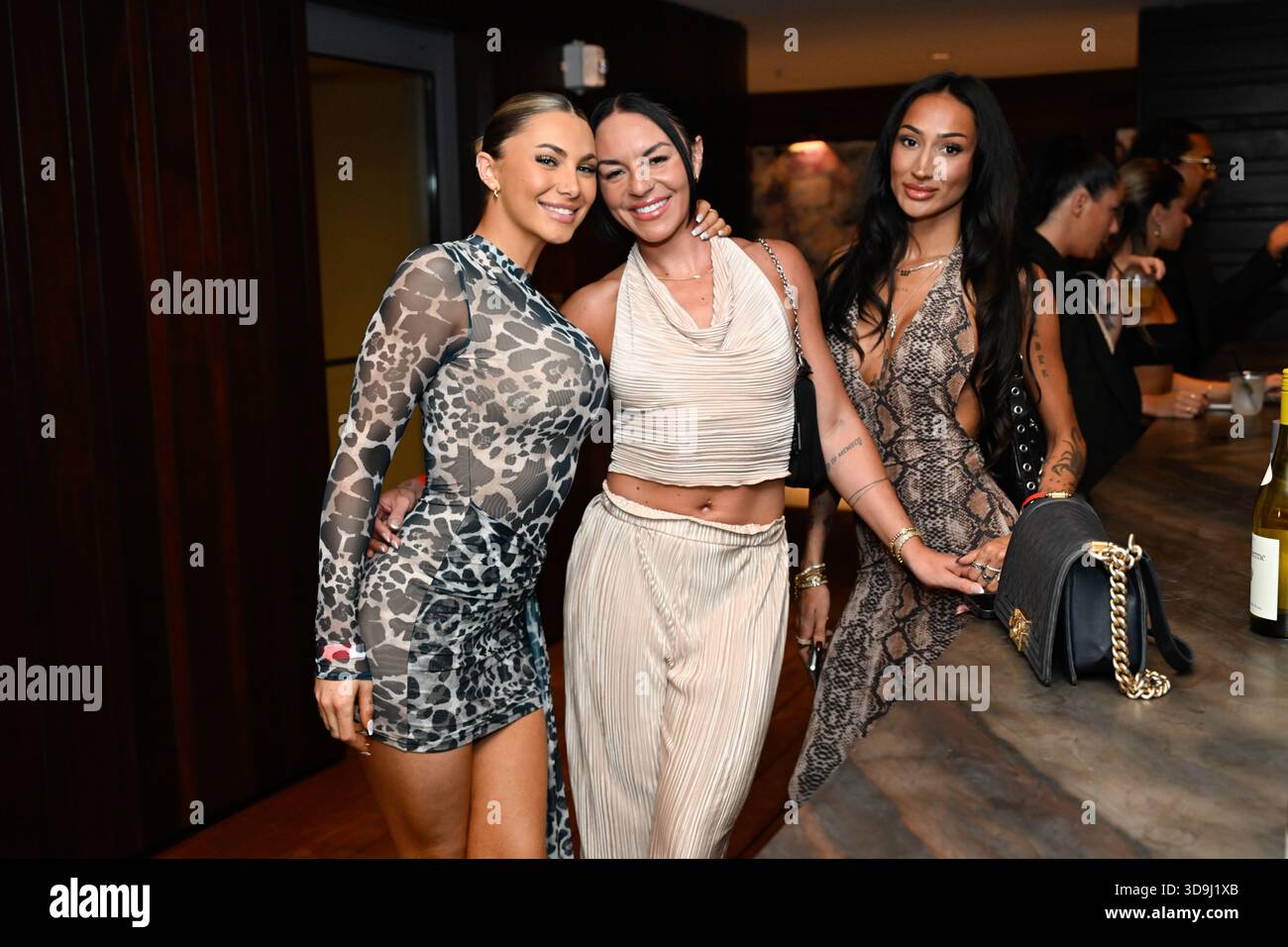 Models Robyne Haney, Victoria Chaulk, and guest attend Swagger Magazine ...