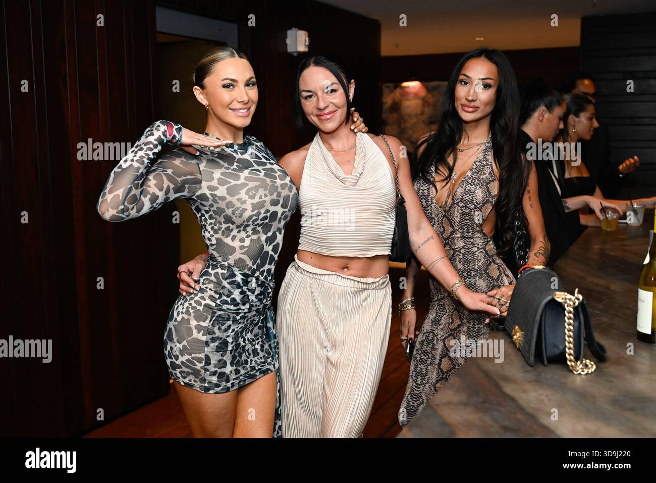 Models Robyne Haney, Victoria Chaulk, and guest attend Swagger Magazine ...