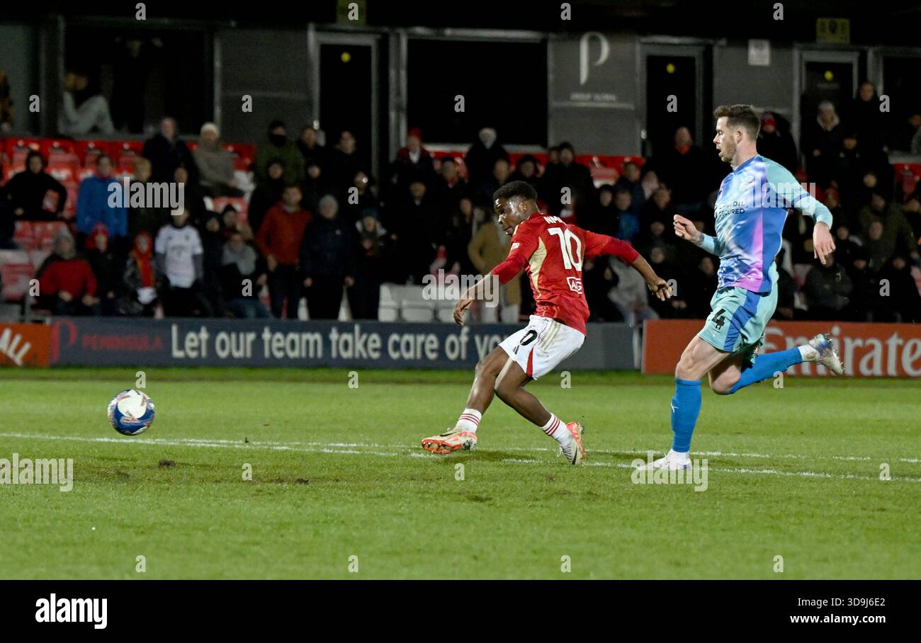 Salford City's Kelly N'Mai scores their side's fourth goal of the game ...