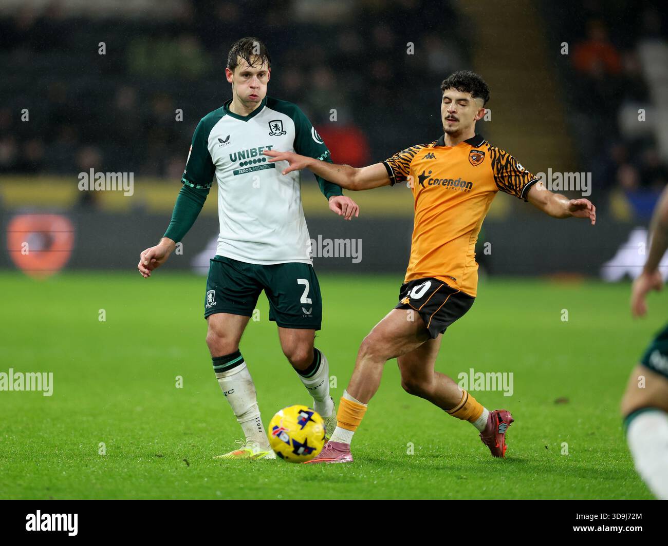 Middlesbrough's Callum Brittain (left) and Hull City's Mohamed Belloumi ...