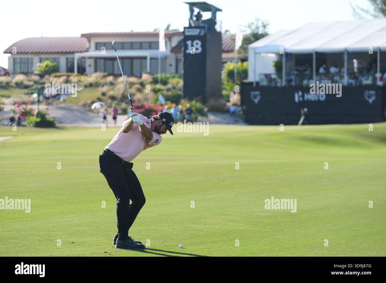 Cameron Young, of the United States, hits from the 18th fairway during ...
