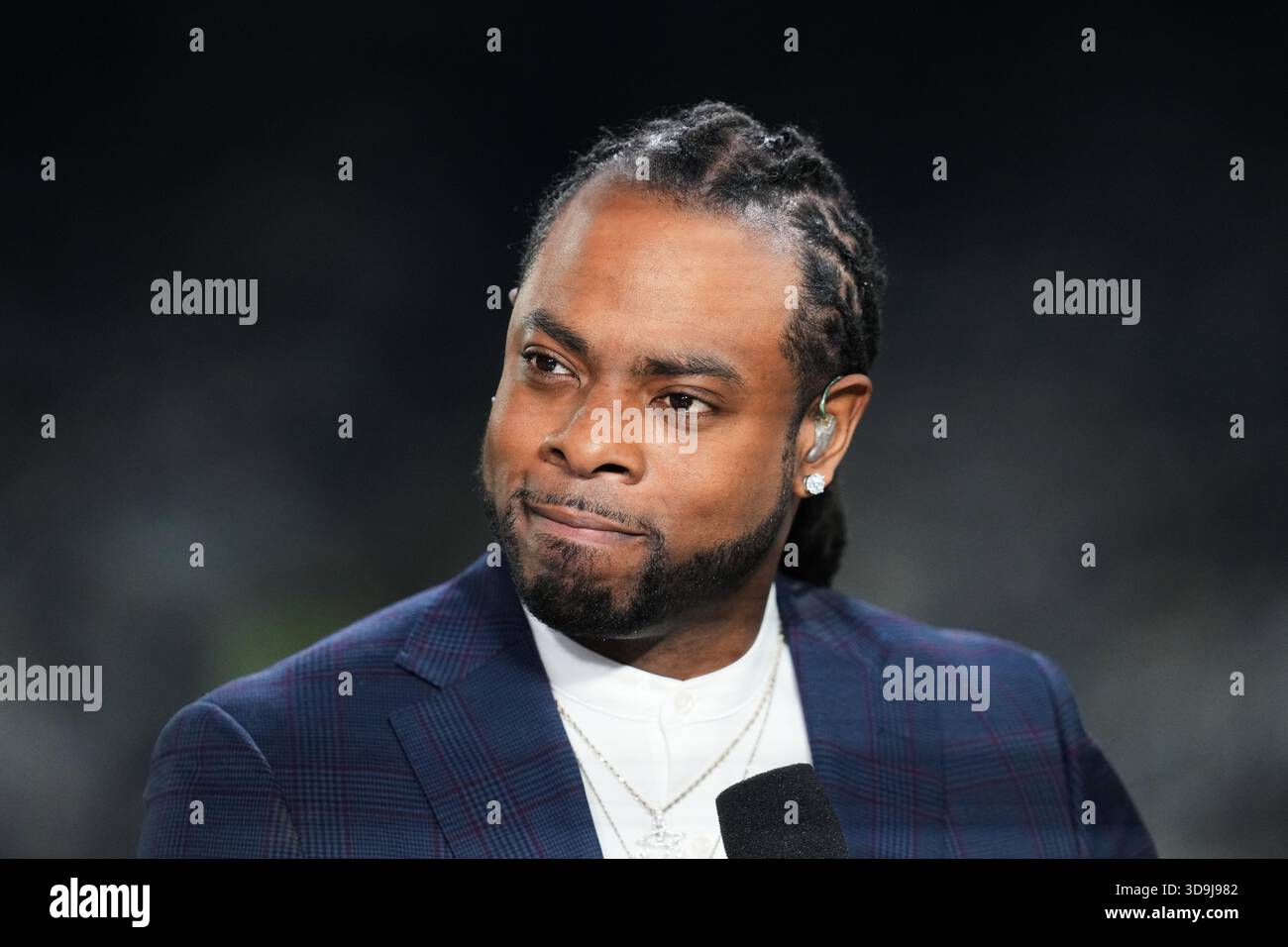 Richard Sherman talks before an NFL football game between the Detroit ...