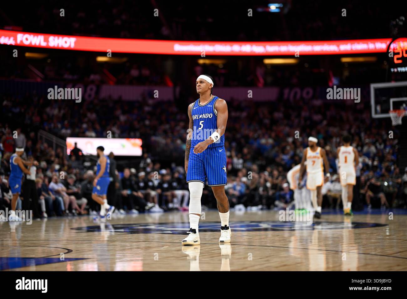Orlando Magic forward Paolo Banchero (5) walks up the court against the ...