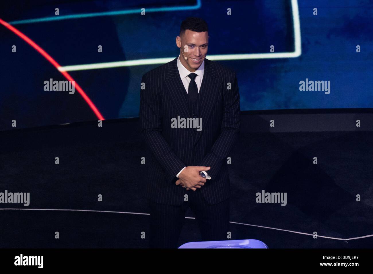 Aaron Judge assists during the 2026 FIFA World Cup draw at the John F ...