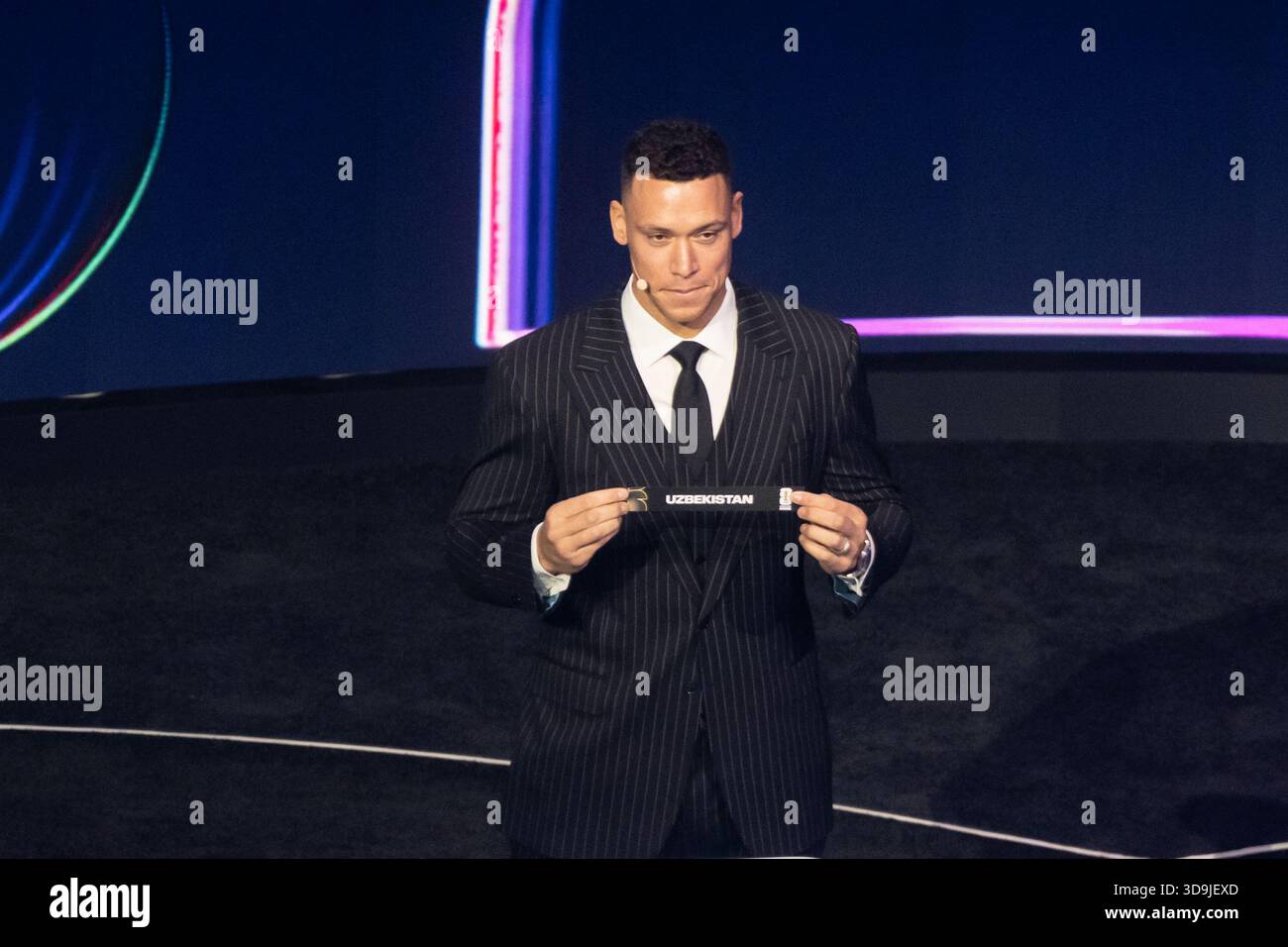 Aaron Judge assists during the 2026 FIFA World Cup draw at the John F ...