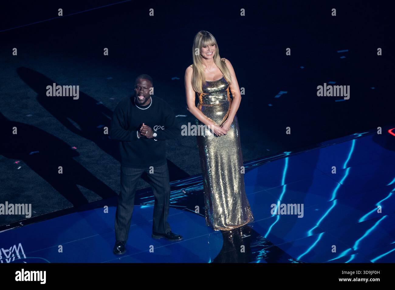 Kevin Hart and Heidi Klum speak on stage during the 2026 FIFA World Cup ...
