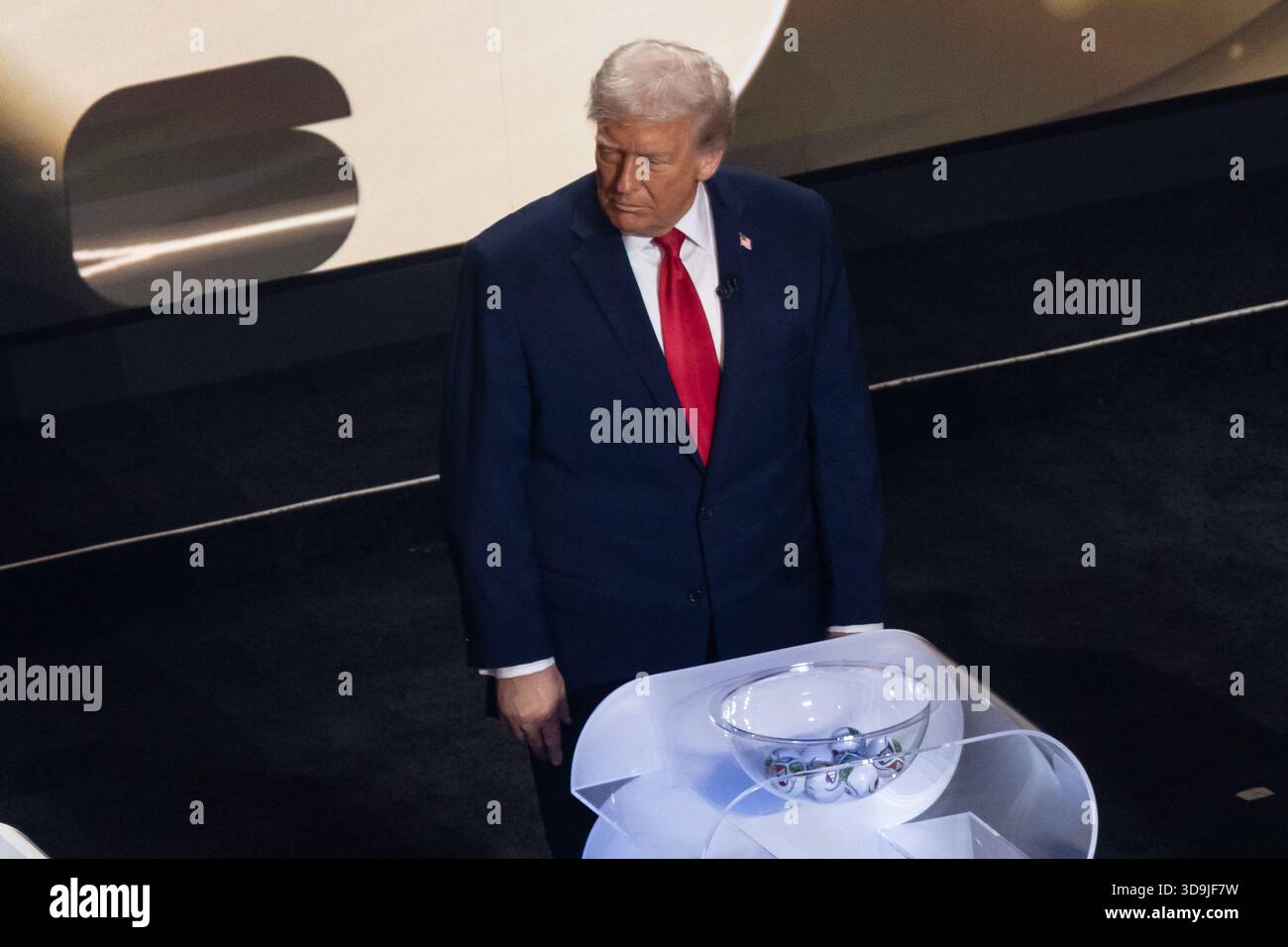 President Donald Trump assists during the 2026 FIFA World Cup draw at ...