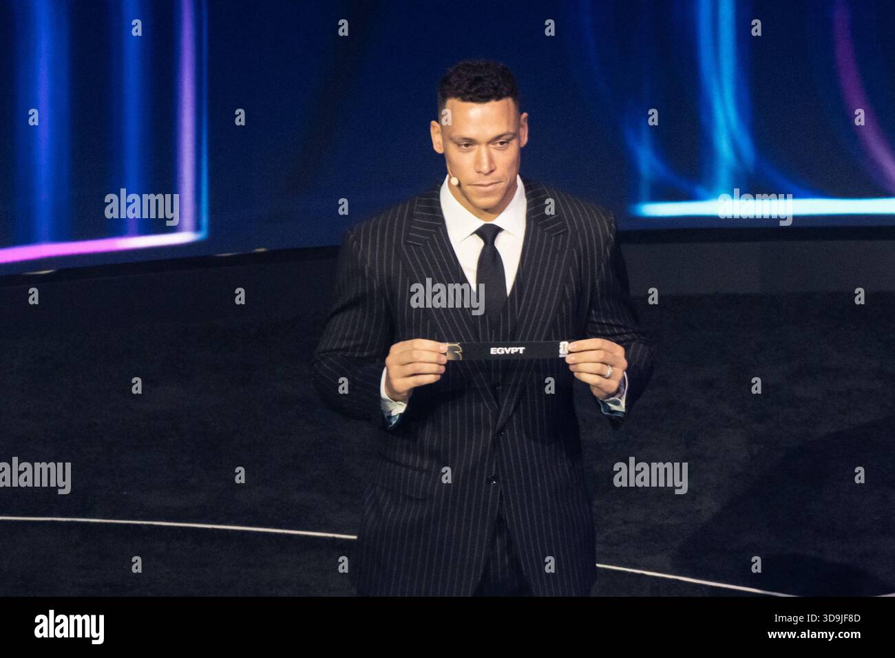 Aaron Judge assists during the 2026 FIFA World Cup draw at the John F ...