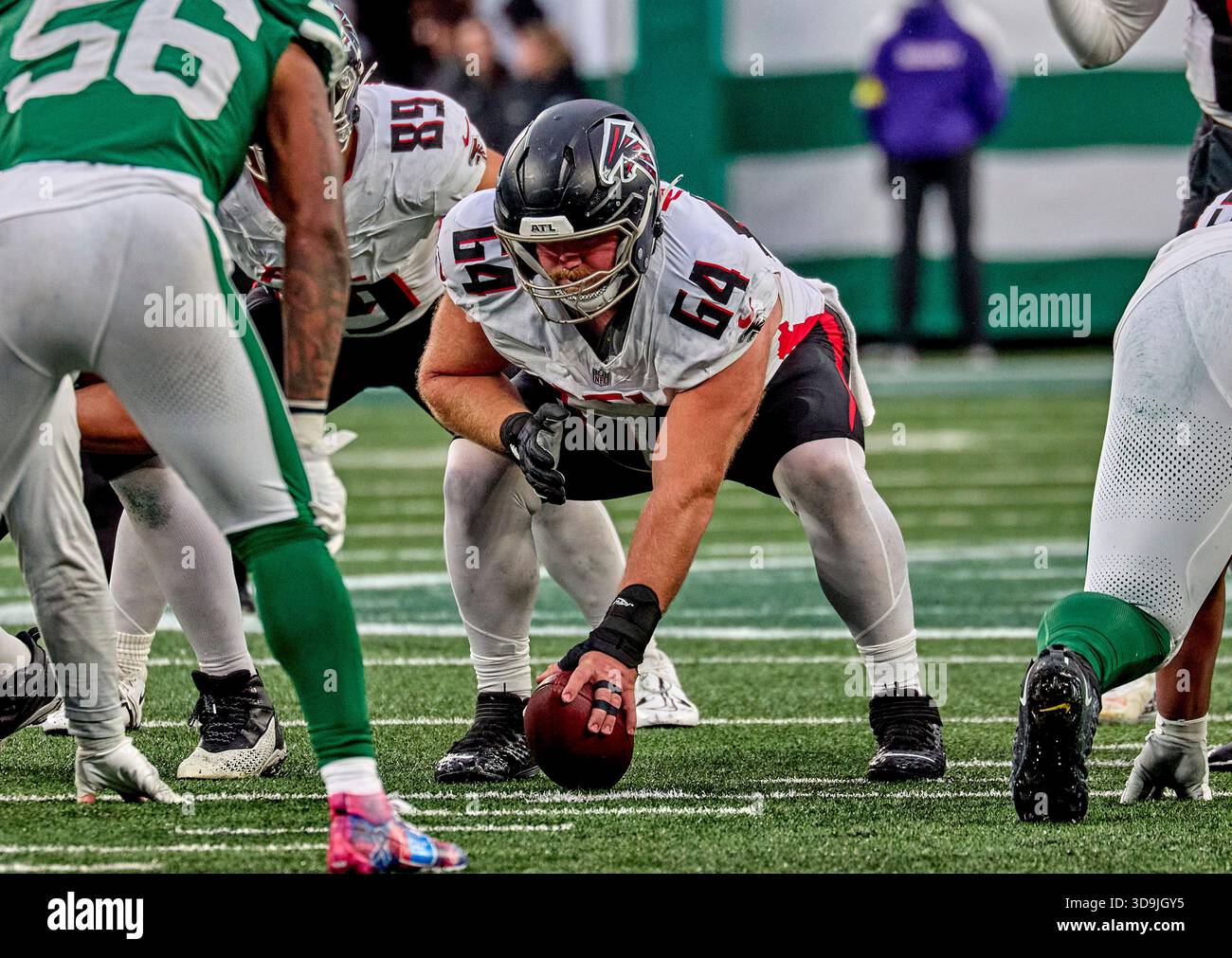 Atlanta Falcons center Ryan Neuzil (64) against the New York Jets at ...