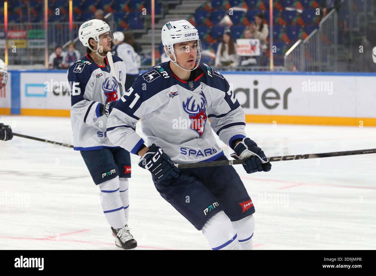 Anton Silayev (21) of Torpedo Hockey Club seen in action during the ...