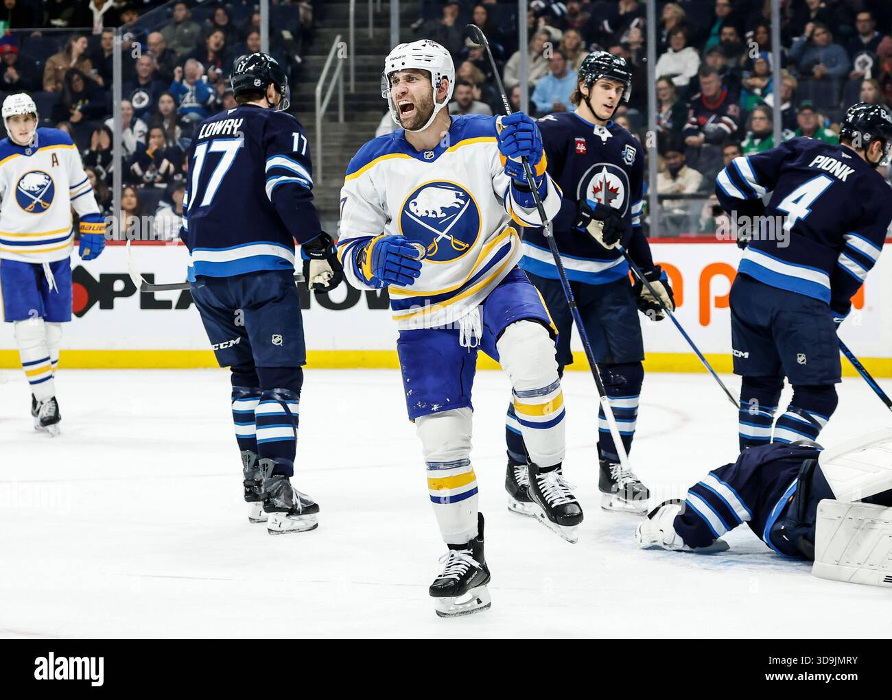 Buffalo Sabres' Jason Zucker (17) celebrates his goal against Winnipeg ...